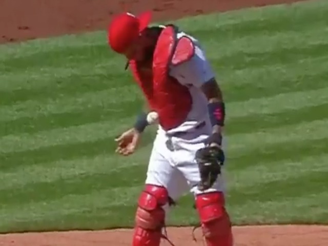 HOW? Watch baseball stick to catcher's chest protector in Cubs ...