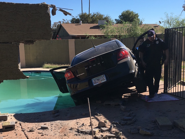 PD: Man evades police, drives into Phoenix wall and pool - ABC15 Arizona